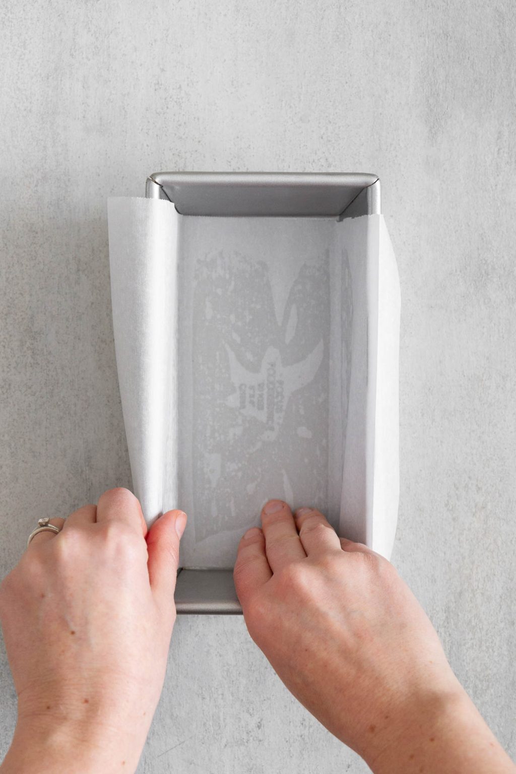 How to Line Baking Pans with Parchment Paper - Girl Vs Dough